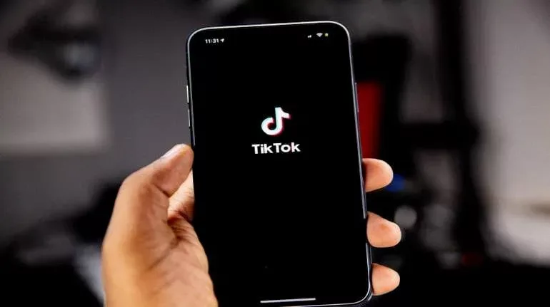 How to Fix Phone Number Conflict on TikTok? - DeviceMAG